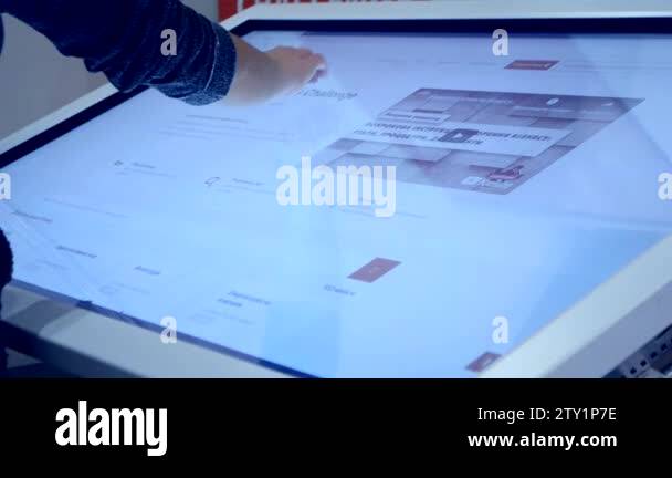 Girl moves drawing with her fingers on the big touch screen Stock Video ...