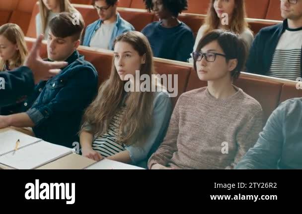 Camera Facing Class: College Professor Gives Lecture to a Classroom ...