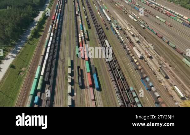 Flying above railroad freight trains. Railroads and export container ...