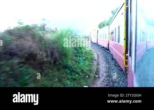 Train moving on mountain slopes, beautiful view, one side mountain, one ...