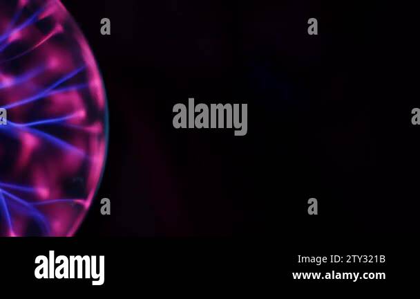 Moving sphere of Plasma lightning ball in a dark, Tesla discharge lamp ...