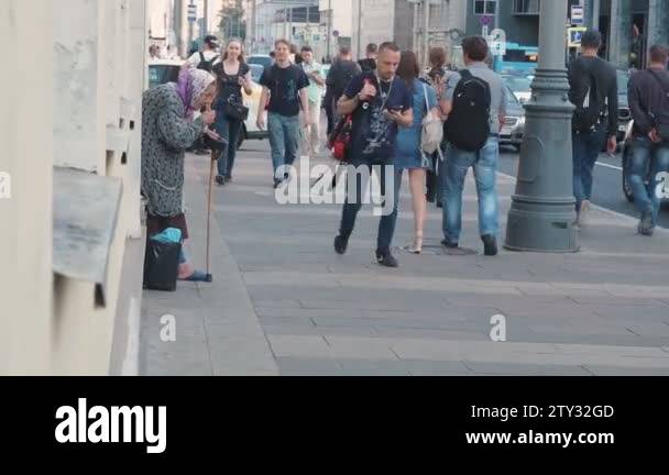 Moscow, Russia - September 6, 2018: Elderly woman asks for alms from ...
