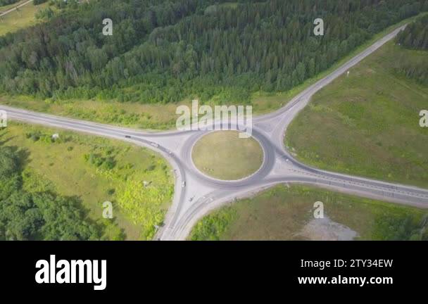 Top view of rural ring road with traffic. Clip. Scenic views of annular ...