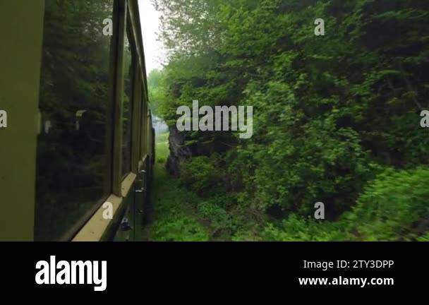 view from the window of a retro train wagon, Old steam locomotive in ...