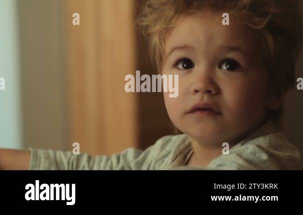 Yucky emotion of childish disgust. Little boy shows a mock disagreement ...