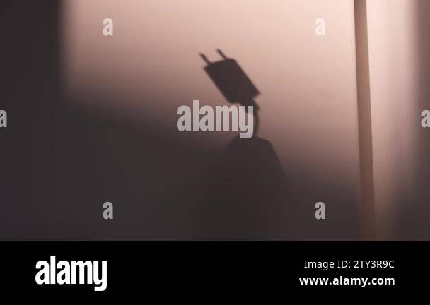 Shadow of the USB wire that is connected to the power plug Stock Video ...