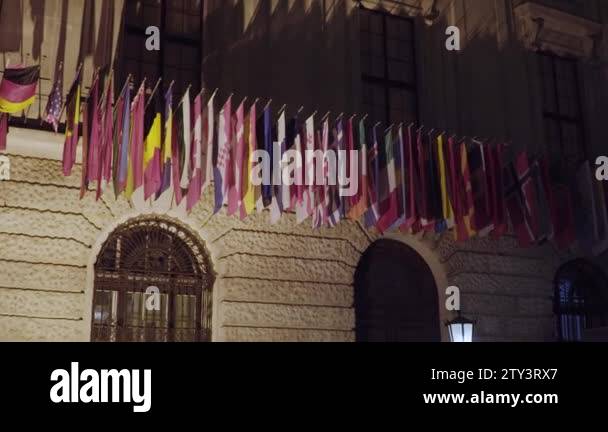 Flags of the OSCE participating States on the headquarters building in ...