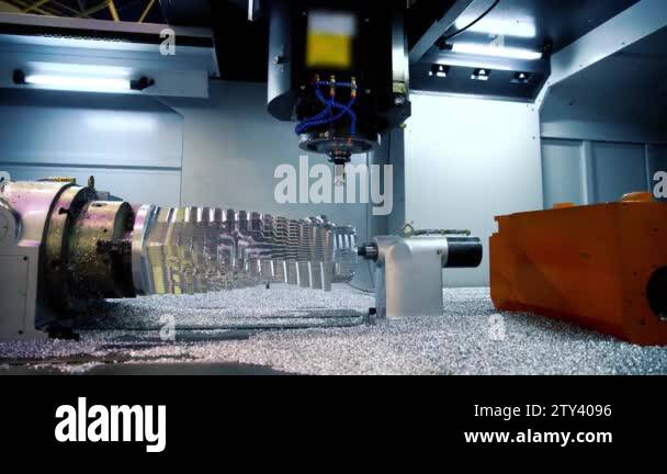 Cnc milling machine. Processing and cutting of parts from a piece of ...