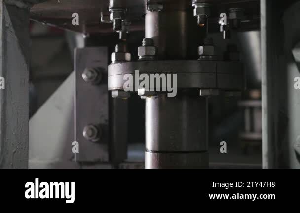 Rotating tube with a round clamp working in a machinery tool of an oil ...