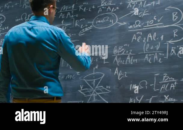 Brilliant Young Mathematician Approaches Big Blackboard and Finishes ...