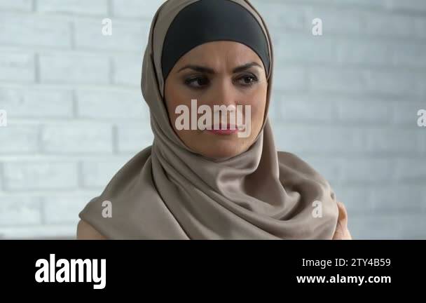 Melancholic arab female in hijab feeling upset after quarrel, stress ...