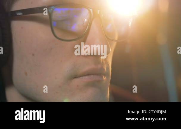 Pc gamer looking at a monitor while playing. Professional Gamer Plays ...