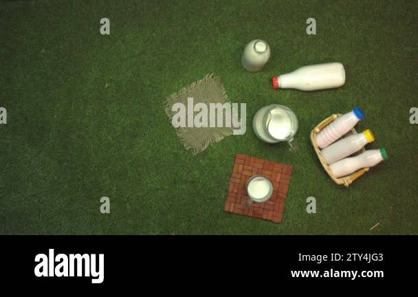 Rice milk. Top view. Slow motion 2x.Rice milk and rice dairy products ...