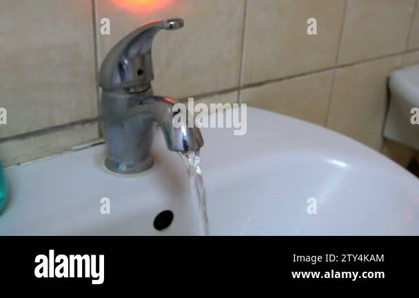 Clean water flows from the dirty tap. Running water. Representing water ...