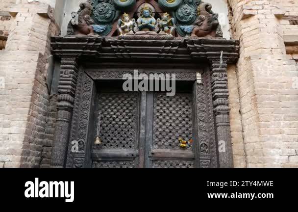 Ornamental design, temple entrance. From below aged entrance with ...
