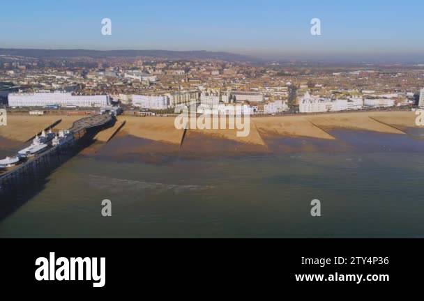 The town of Eastbourne and its famous pier from above Stock Video ...