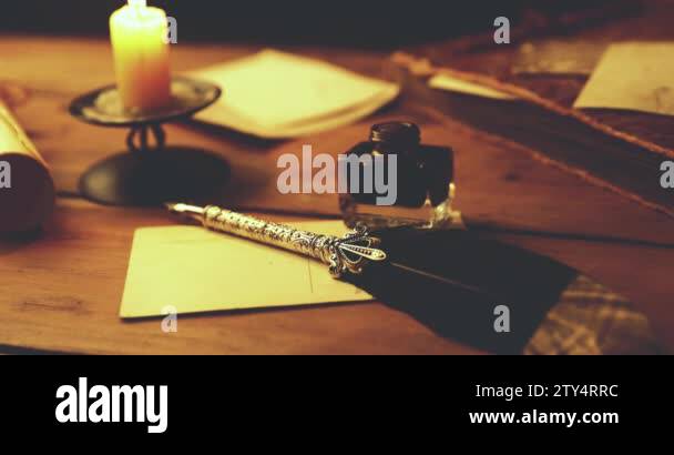 writing letter with quill pen and ink in candlelight Stock Video ...