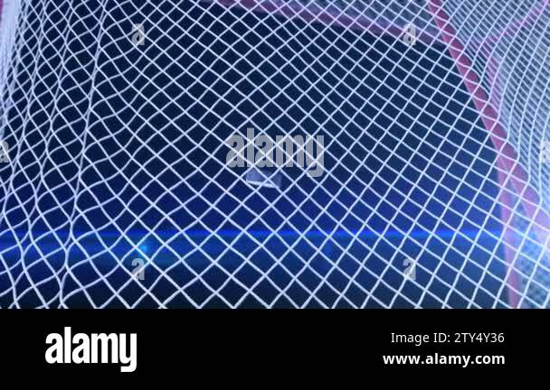 Hockey Puck Flying into Gates Grid in Slow-Motion with Spotlight Flares ...