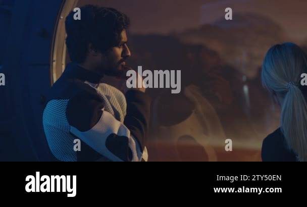 Astronauts talking by Martian base window Stock Video Footage - Alamy