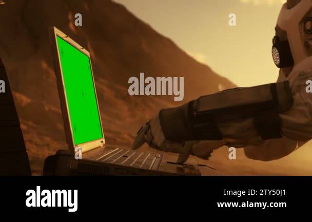 Astronaut on the Alien Red Planet/ Mars Works on a Mock-up Green Screen ...