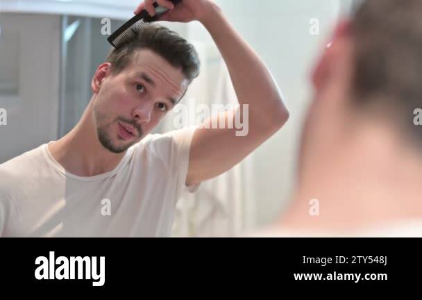 Man combing hair in Stock Videos & Footage - HD and 4K Video Clips - Alamy