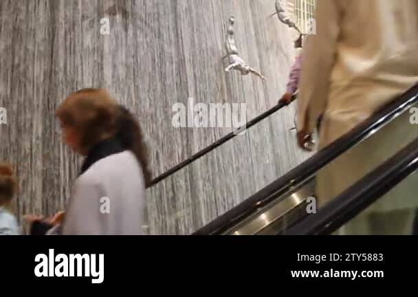 Human waterfall in the Dubai Mall, one of the largest malls in the ...