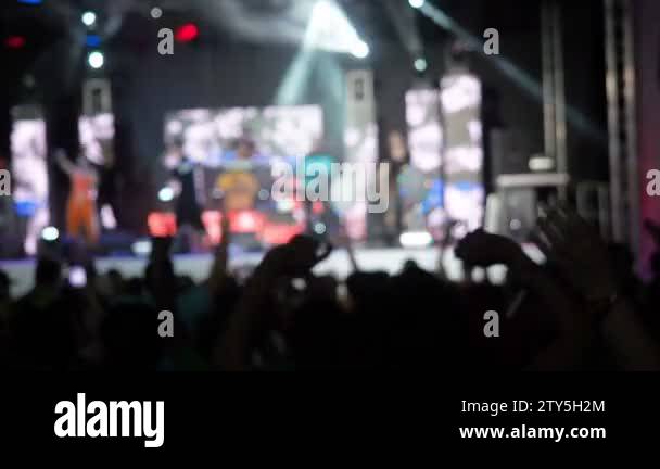 Blured Slow Motion Video Background Audience Waving Their Arms ...