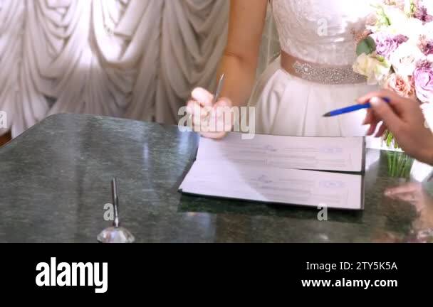 wedding traditions, ceremonies. wedding ceremony. newlyweds sign in ...