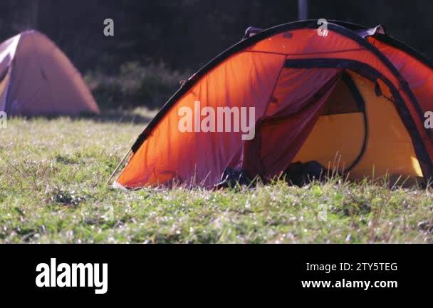 Red hiking tent in green forest Stock Videos & Footage - HD and 4K ...