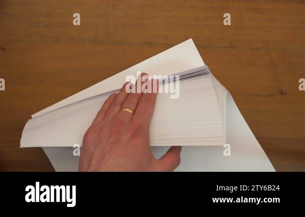 A4 paper pile Stock Videos & Footage - HD and 4K Video Clips - Alamy