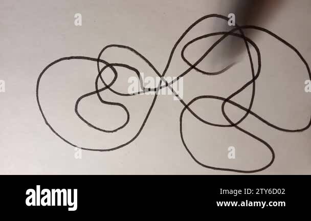 The process of drawing chaos black felt-tip pen. Spontaneous, abstract ...