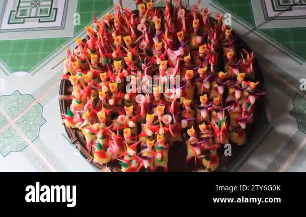 Tohe, the traditional toys in Vietnam made by colored rice powder Stock ...