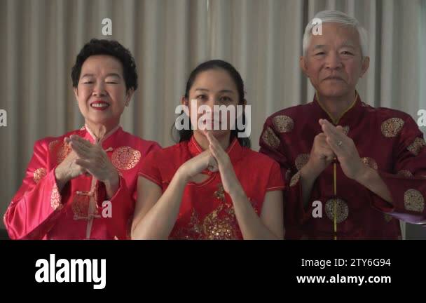 Family salute etiquette palm and fist gesture bounding Chinese New Year ...
