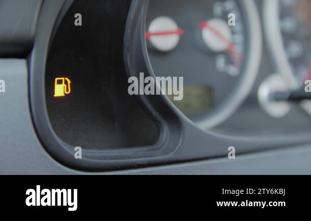 Close-up car dash board petrol meter, fuel gauge. Low level of fuel ...