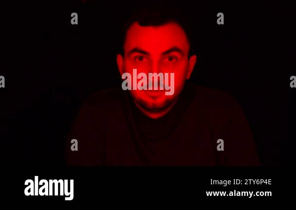 Man Face in Dark, with Red Glowing Light, Facial Expressions. Portrait ...