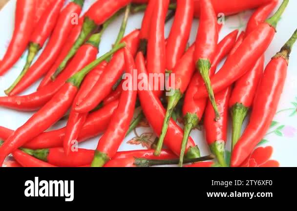 Eating chillis Stock Videos & Footage - HD and 4K Video Clips - Alamy