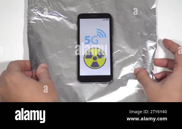 5g network danger concept. Man putting a smartphone to his ear. Back ...