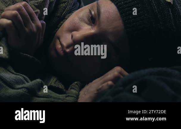 Homeless teen boy crying, missing home, orphan or child abandoned by ...