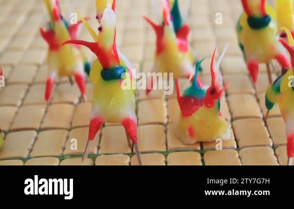 Tohe, the traditional toys in Vietnam made by colored rice powder Stock ...