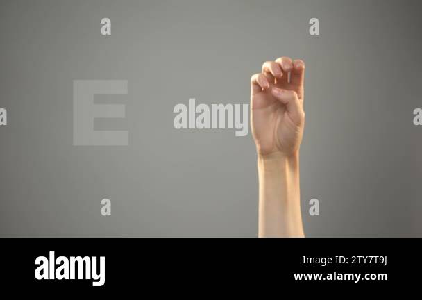 Letter E in sign language, hand on background, communication for deaf ...