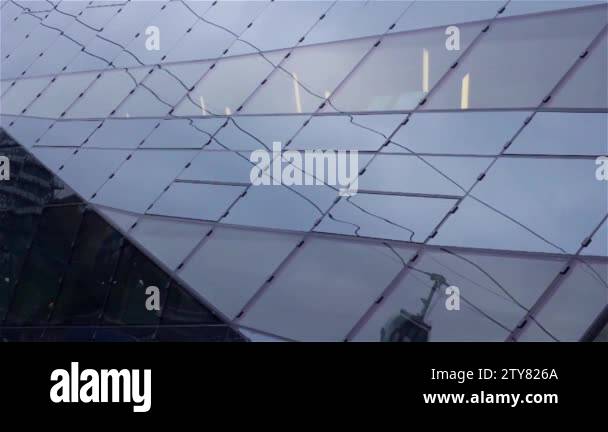 Funicular going up the line with abstract reflection on modern glass ...