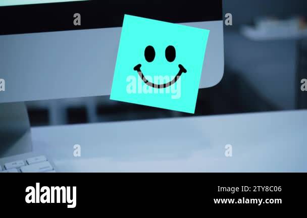 Smile character. Smile drawing on sticker on monitor. Message ...