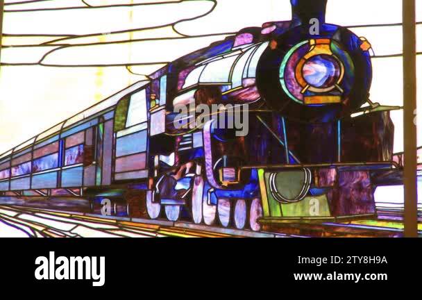 Stained glass window of a locomotive train Stock Video Footage - Alamy