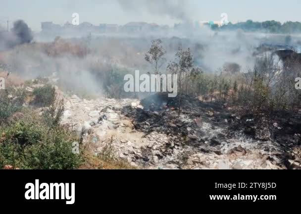 Video illegal burn refuse, poisonous smoke, fire and fumes, clouds of ...