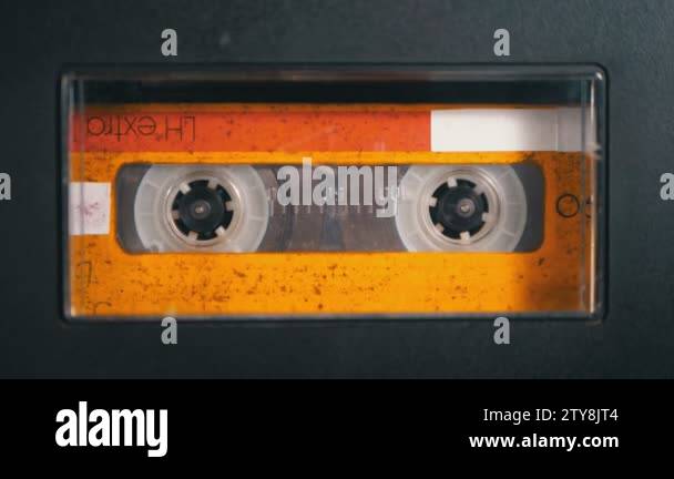 Audio Cassette is inserted into the Deck of the Audio Tape Recorder ...