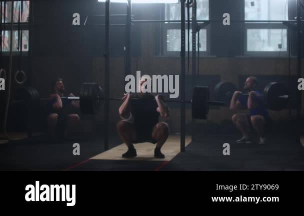 Three fitness man bodybuilder training using barbell weightlifting ...