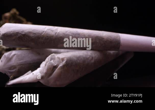 Rolled up cannabis joint Stock Videos & Footage - HD and 4K Video Clips ...