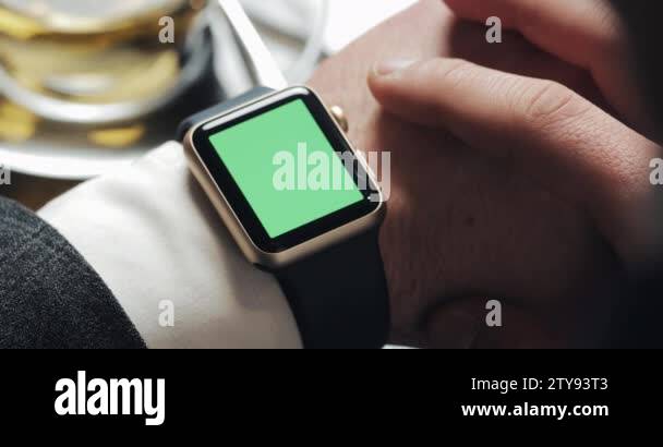 Close up of business man hands with smartwatch green screen chroma key ...