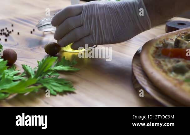 Pizzaillo cooking pizza in italian pizzeria. Chef cook preparing pizza ...