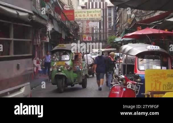 BANGKOK, THAILAND - MARCH 2017, POV: Snapshot of daily life of local Thai people in Bangkok's ...